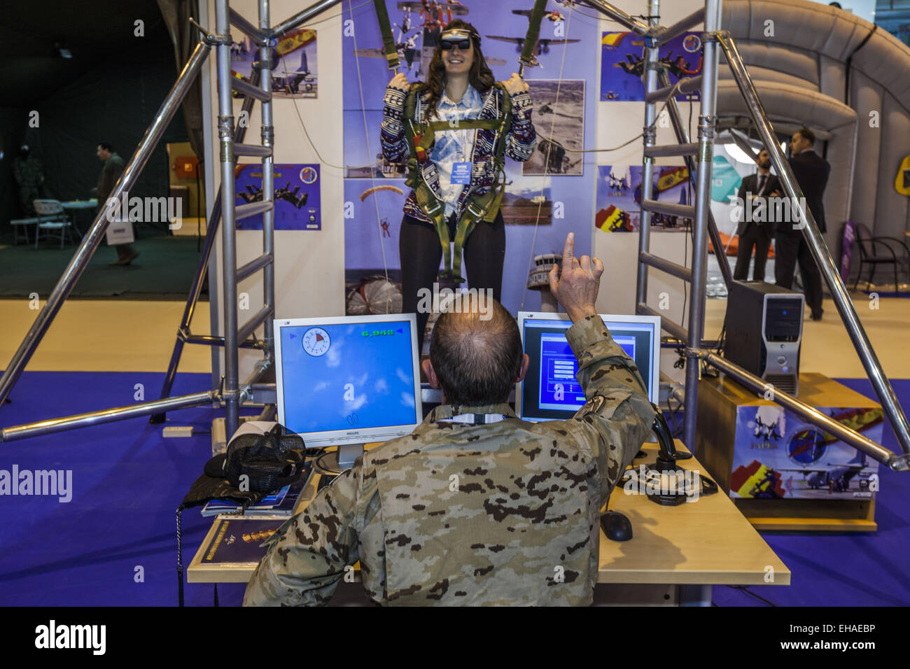 Madrid, , Spain. 10th Mar, 2015. Woman in the parachute jump simulator ...