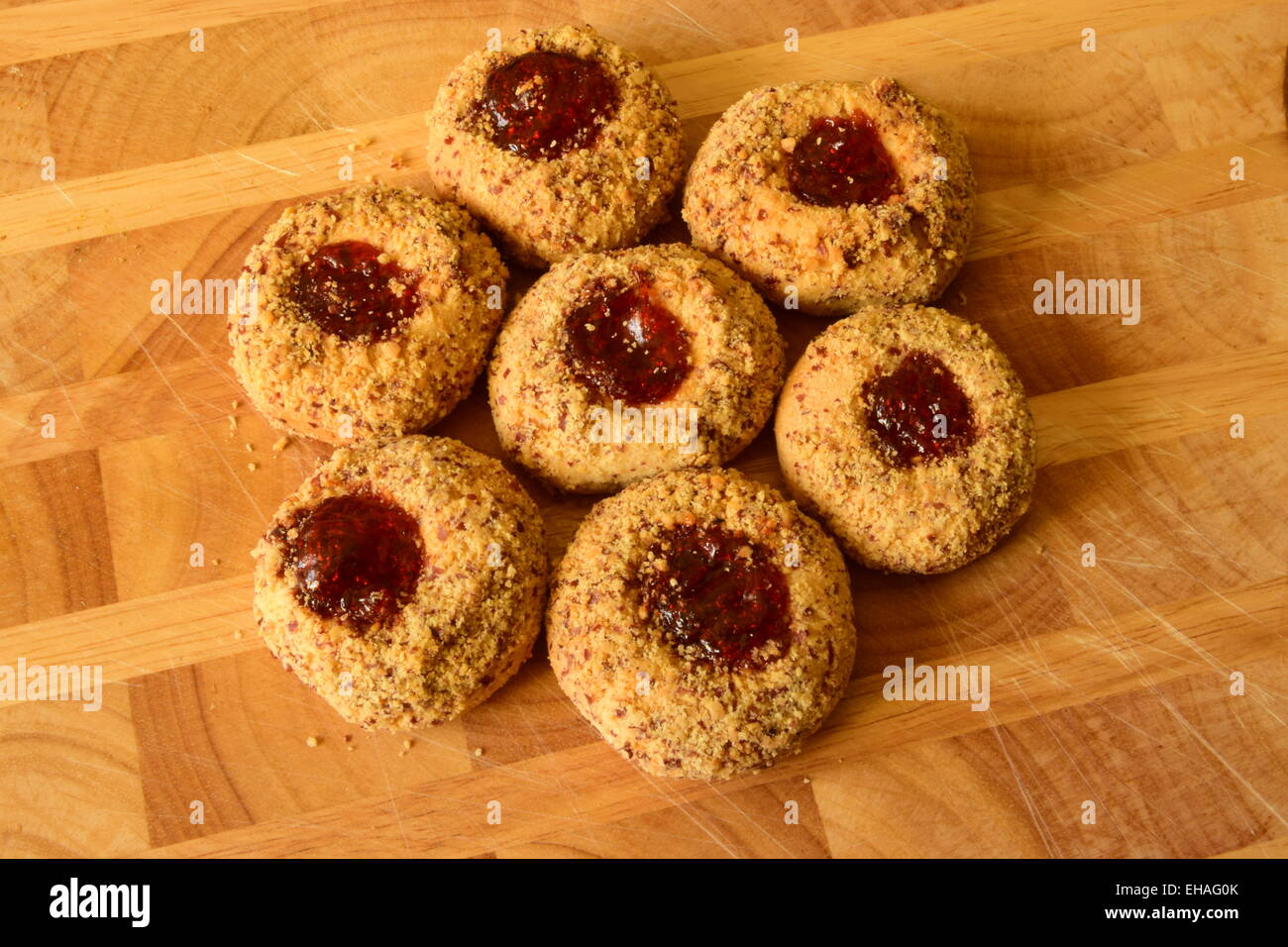 Round biscuits with red jam Stock Photo - Alamy