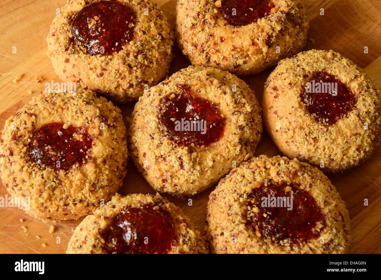 Round biscuits with red jam Stock Photo - Alamy