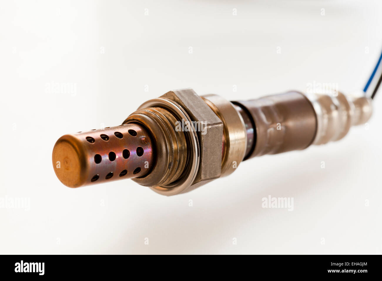 Car oxygen sensor closeup Stock Photo - Alamy