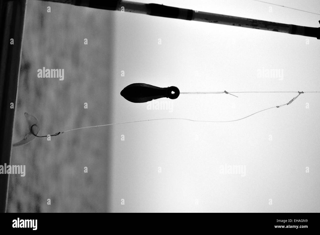 fishing rod hook and bait Stock Photo - Alamy