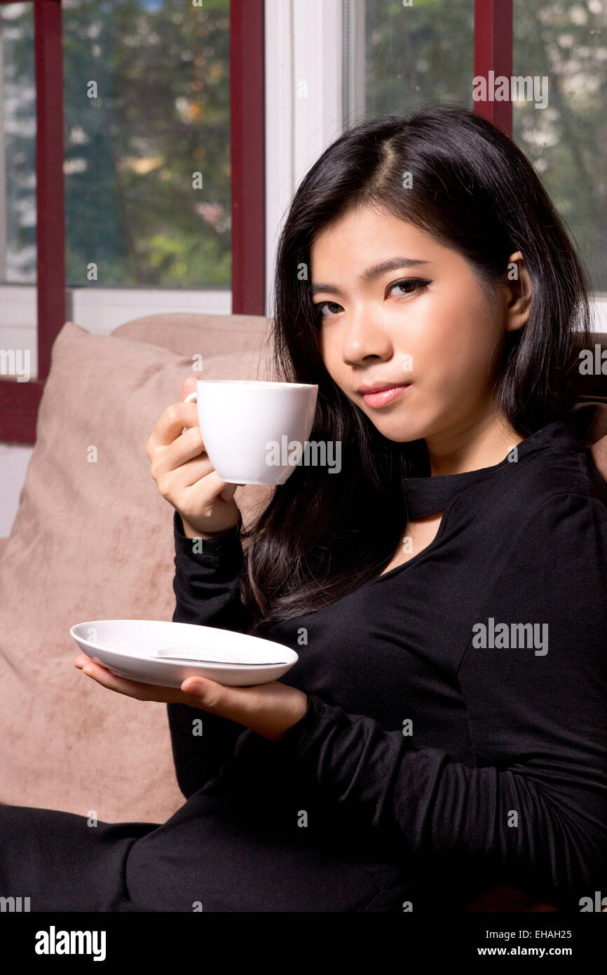 A young lady in a cafe in Saigon, Vietnam Stock Photo - Alamy