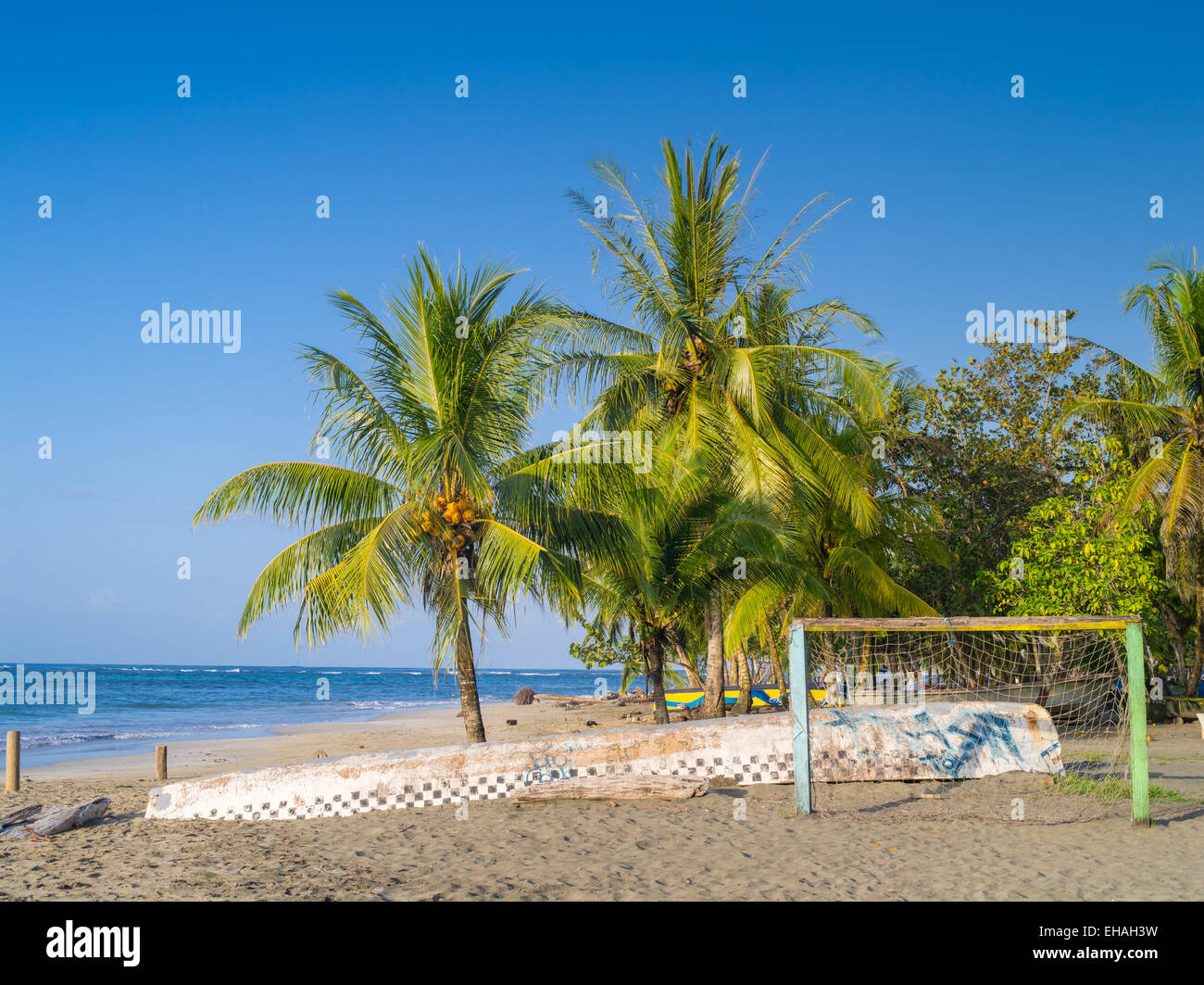 The sun sets at the beach at Manzanillo, Limon, Costa Rica Stock Photo ...