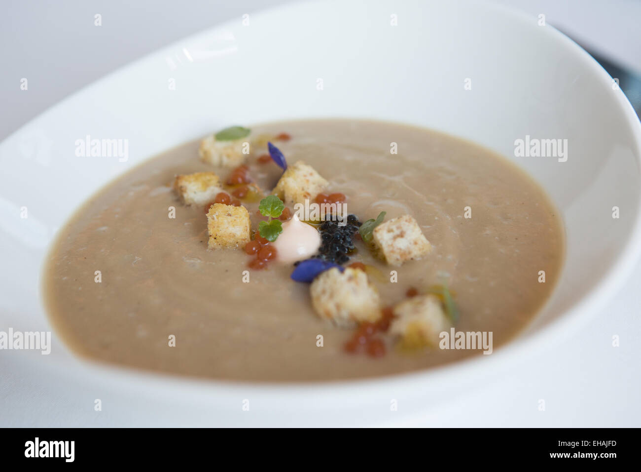 Caramelized cauliflower soup with smoked salmon mousse, Ossetra and ...