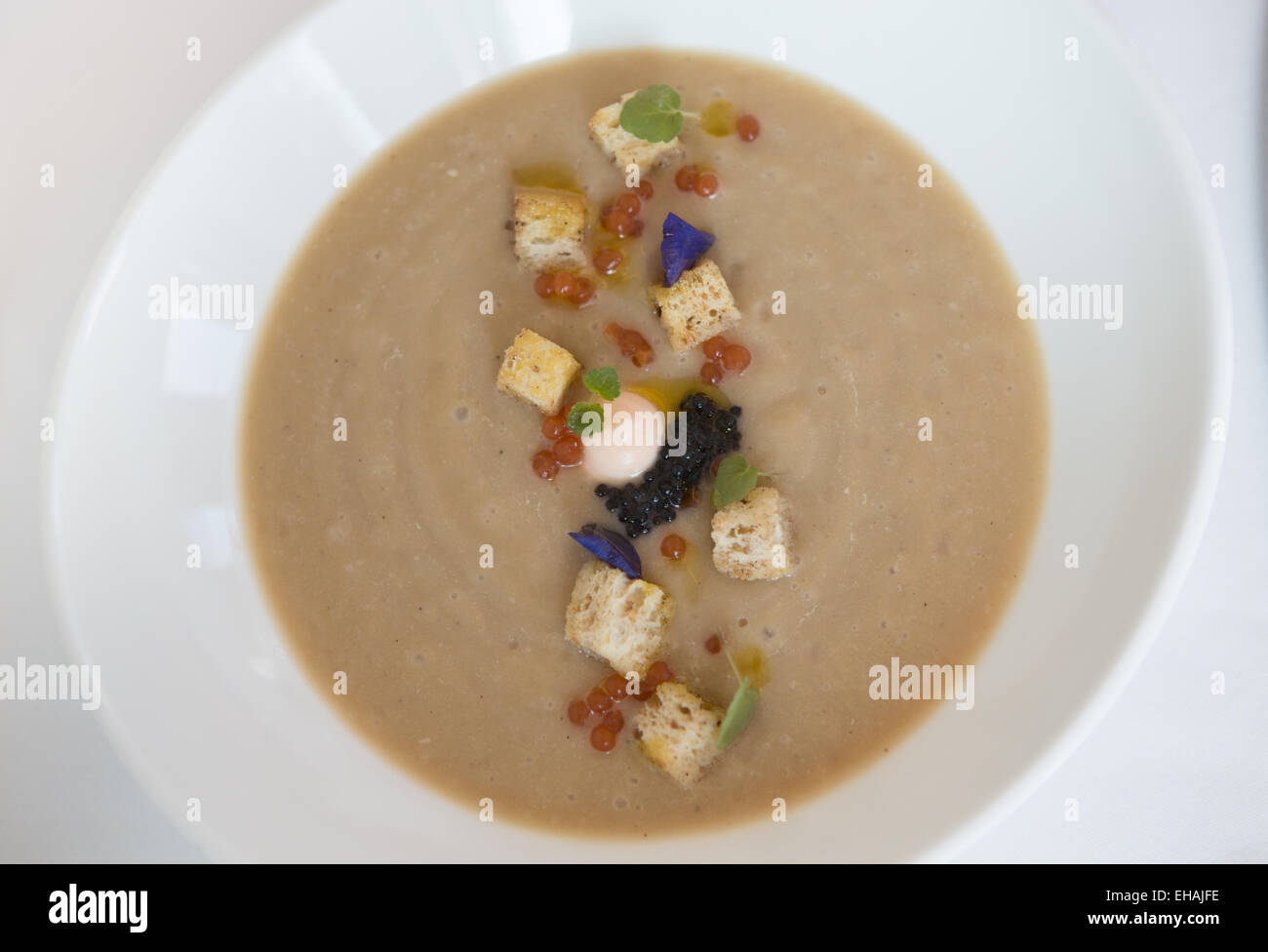 Caramelized cauliflower soup with smoked salmon mousse, Ossetra and ...