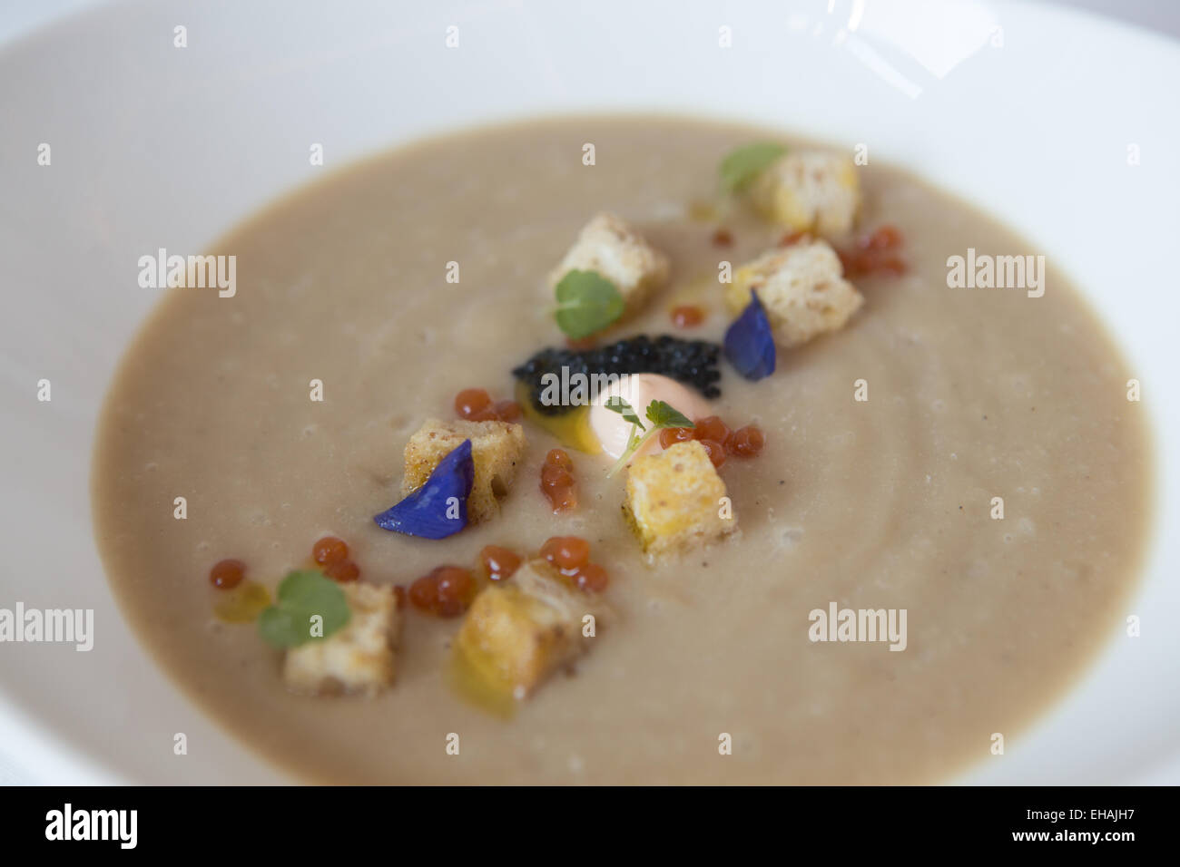 Caramelized cauliflower soup with smoked salmon mousse, Ossetra and ...