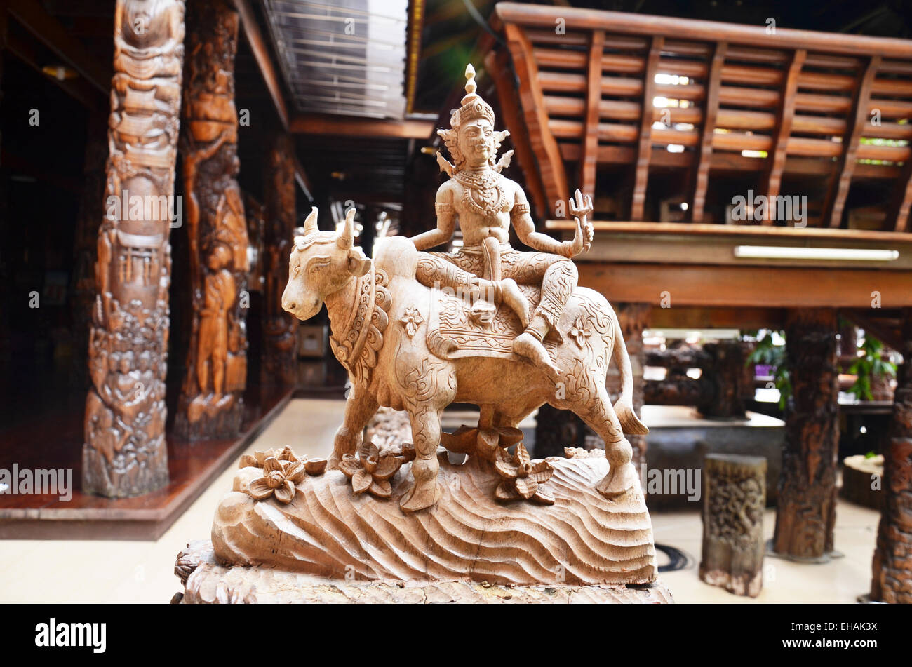 Traditional Thai style wood carving as angel riding ox one of 12 Zodiac ...
