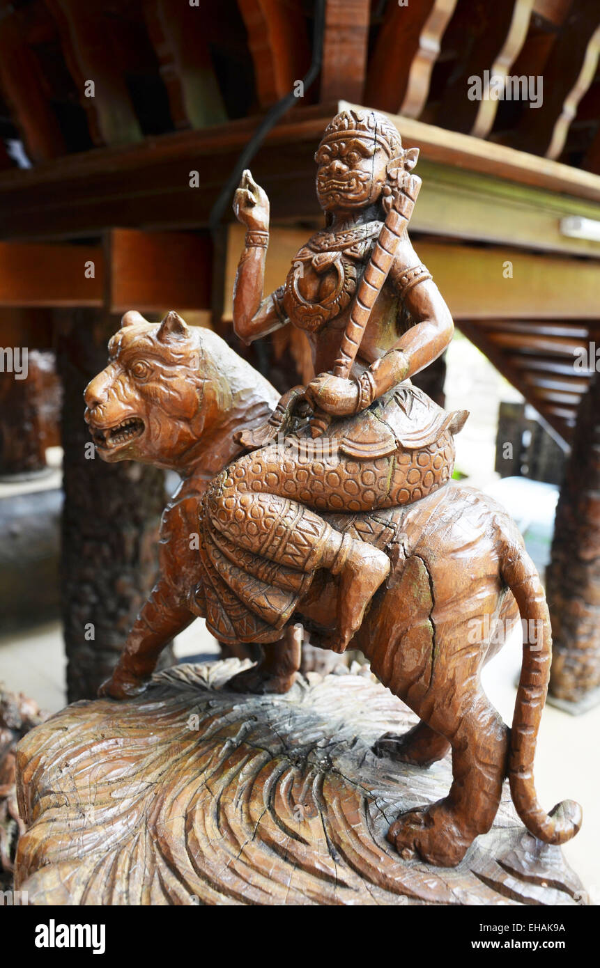 Traditional Thai style wood carving as giant riding tiger one of 12 ...