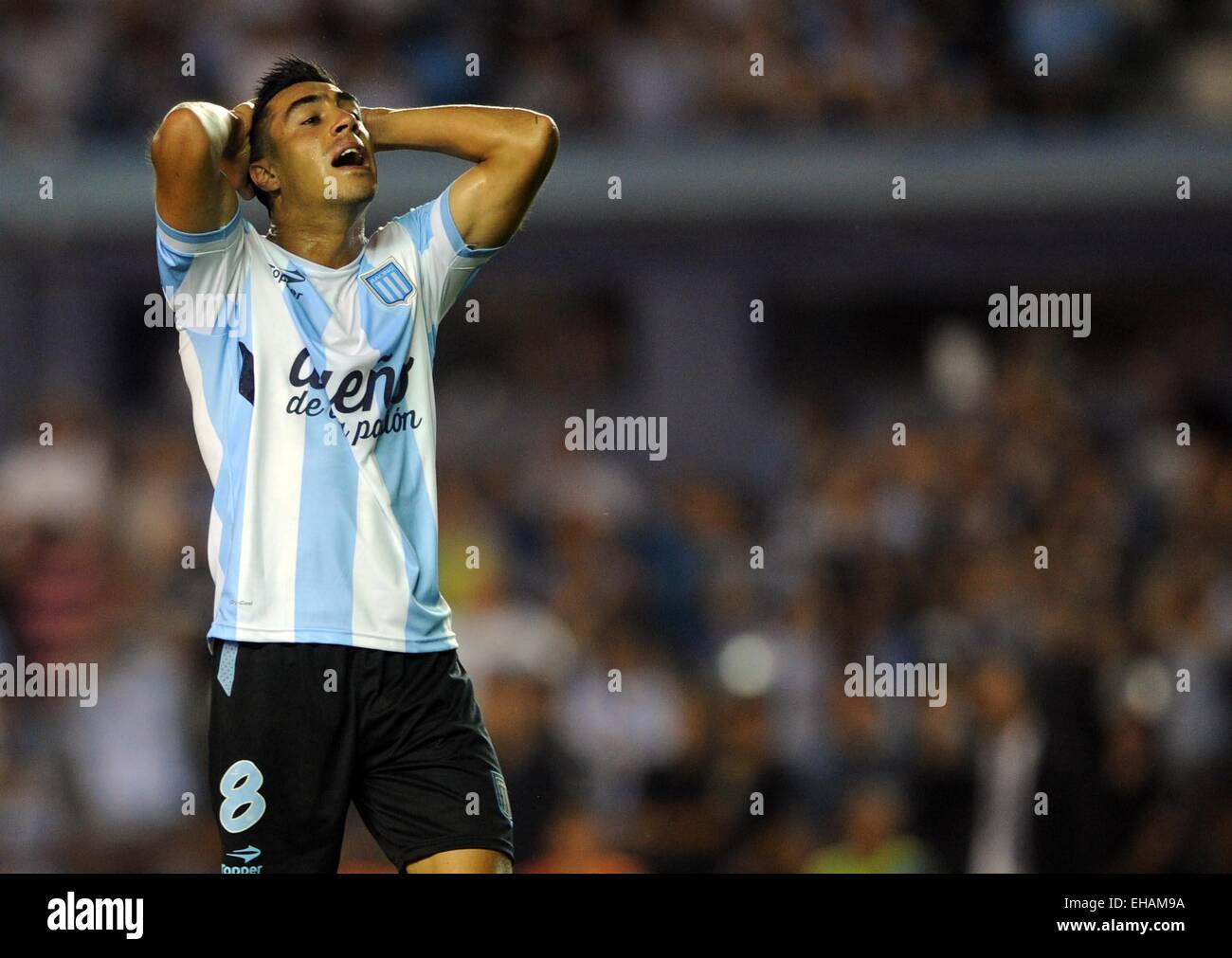 Buenos Aires, Argentina. 10th Mar, 2015. Racing Club's Washington Camacho of Argentina reacts ...