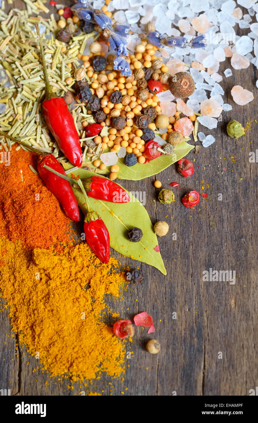 Spices and utensil on wooden table background hi-res stock photography ...
