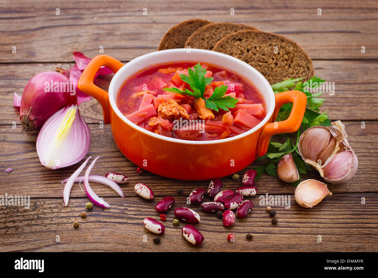 Ukrainian and Russian national Red Borscht on wooden surface, menu ...