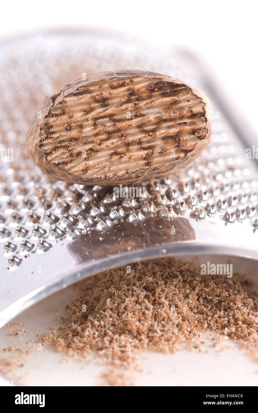 Close up nutmeg and grater Stock Photo - Alamy
