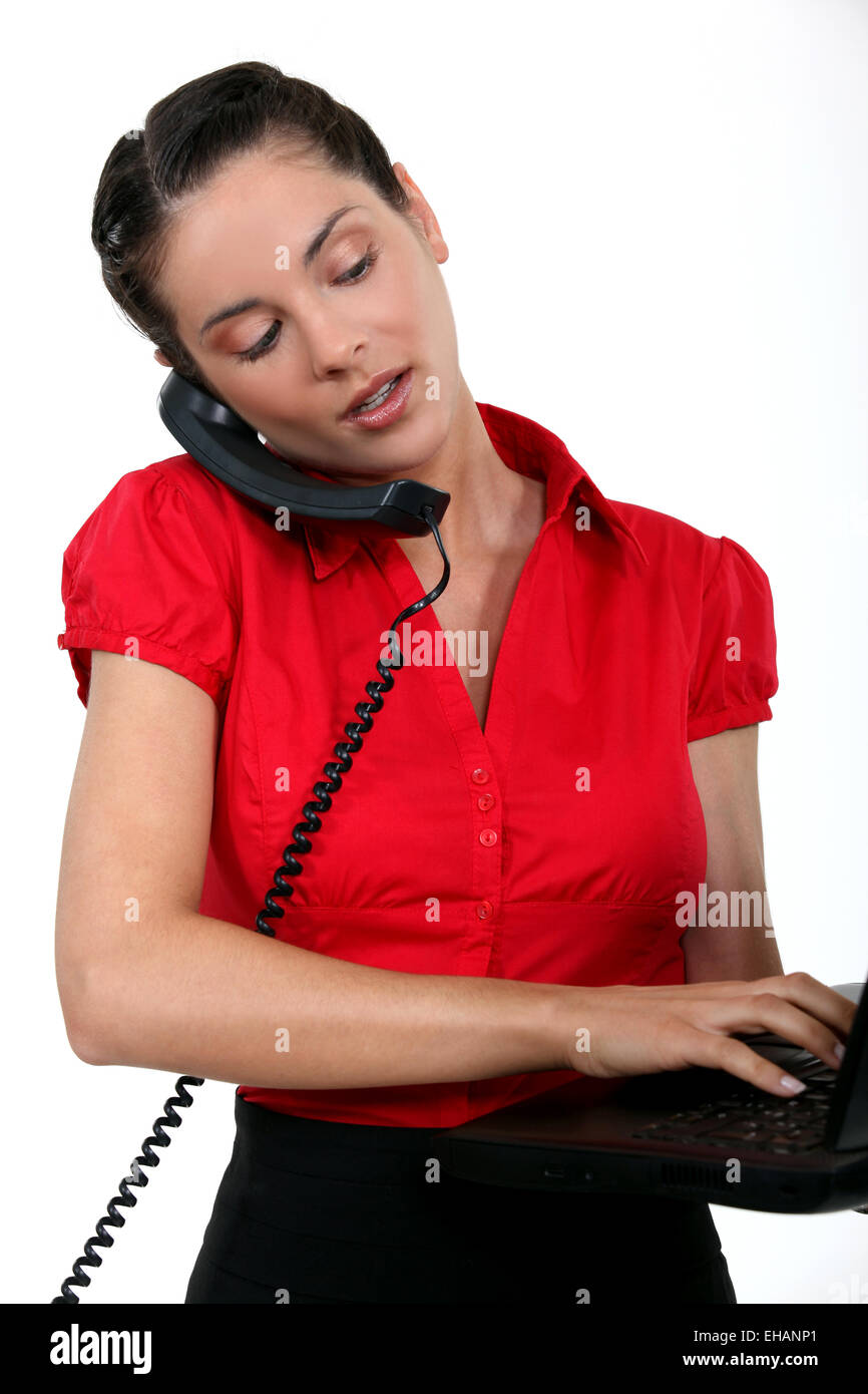 A busy female executive Stock Photo - Alamy