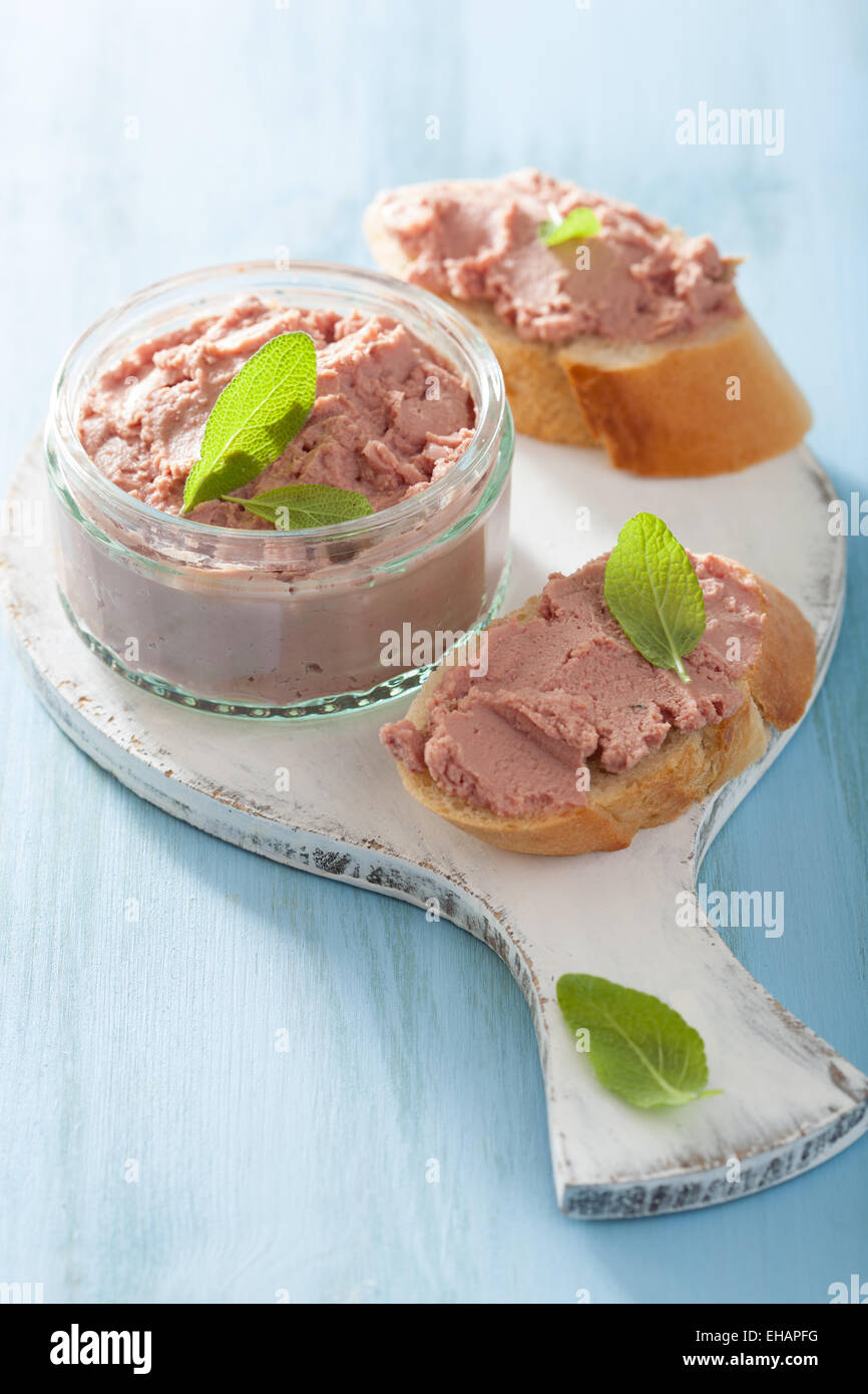 healthy chicken liver pate with sage in jar and on bread Stock Photo ...