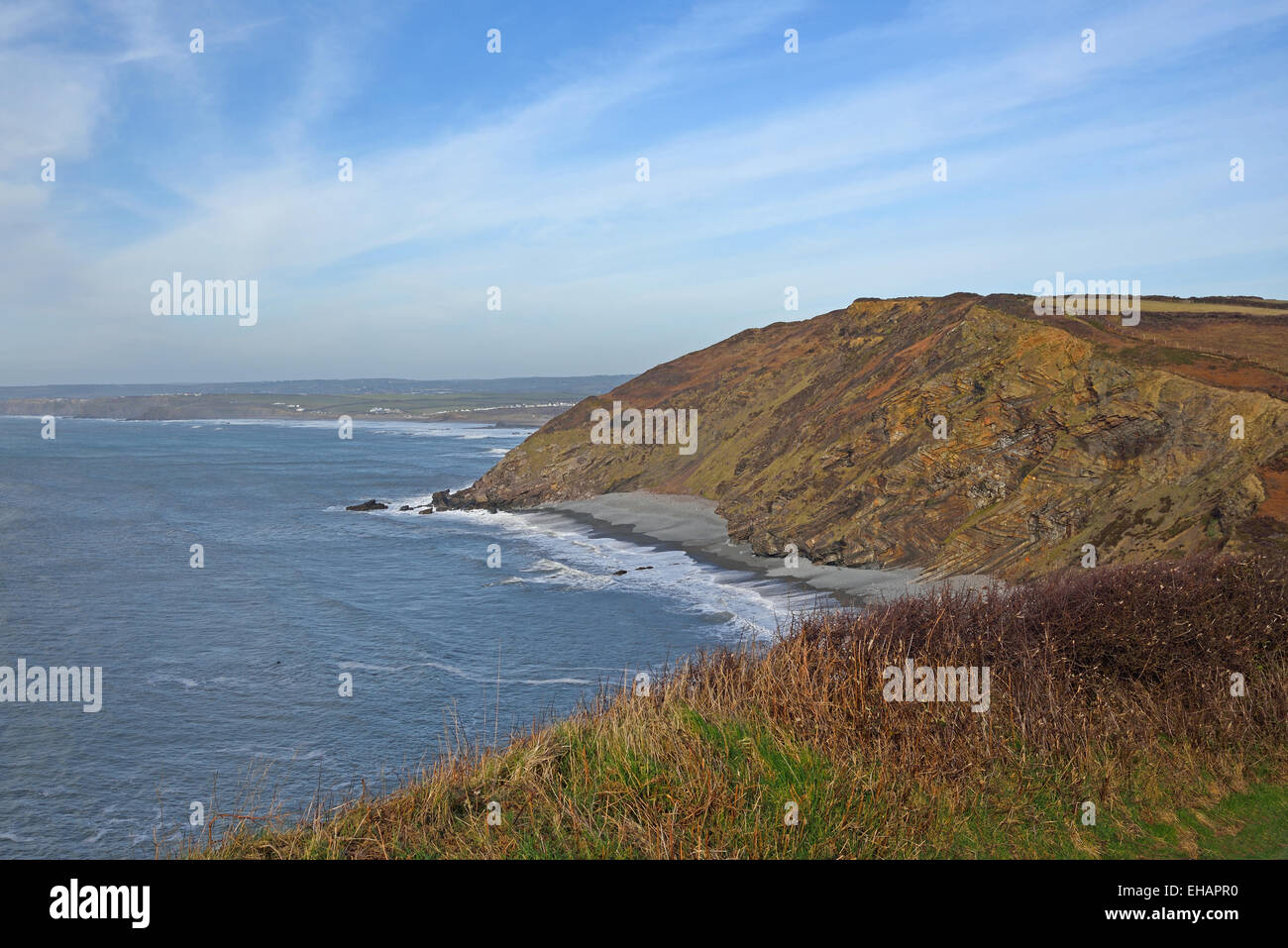 Millook , Cornwall. The cliffs display a series of recumbent chevron ...
