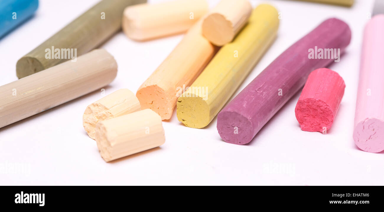 many colorful pastel chalks on white background Stock Photo - Alamy