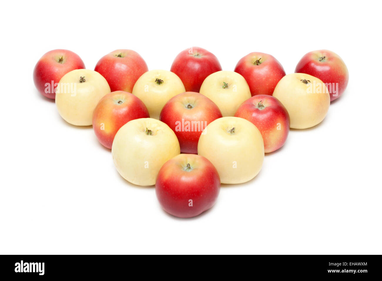 Red and yellow apple put by triangle Stock Photo - Alamy