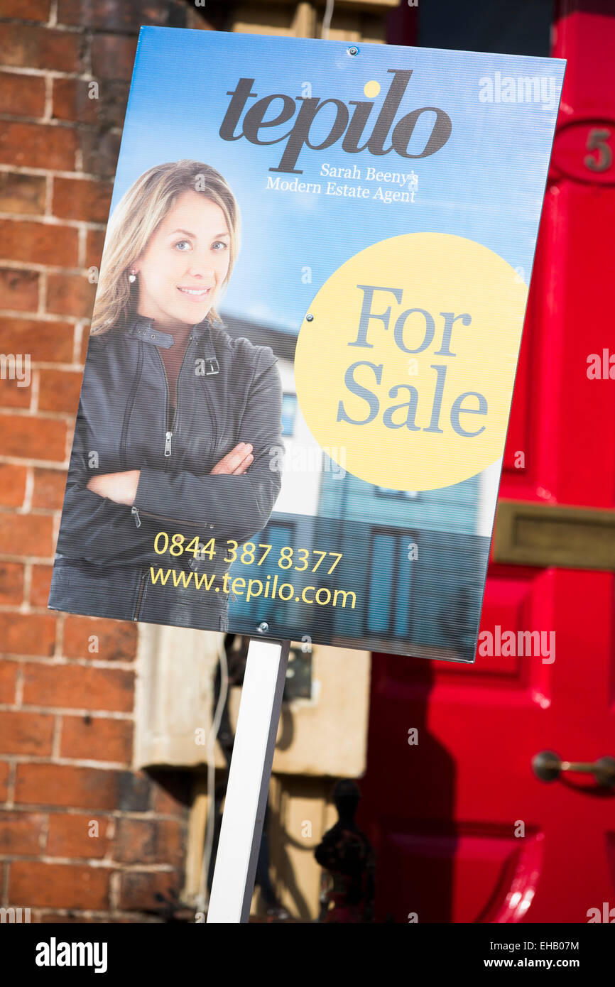 Sign for Tepilo, Sarah Beeny's modern estate agent outside a terraced ...