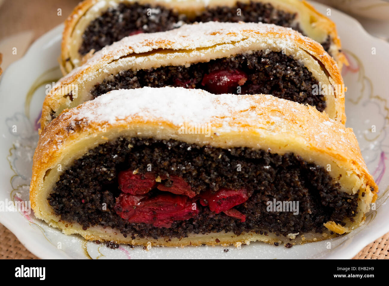 Poppy seed strudel with cherry Stock Photo - Alamy