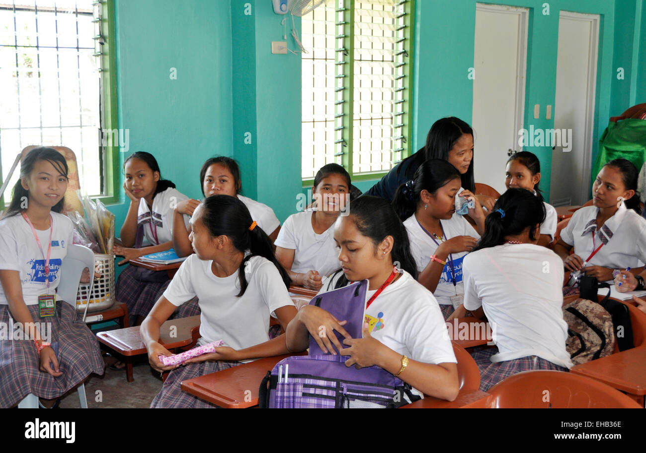 Some classrooms devastated by the Haiyan typhoon are repaired in ...