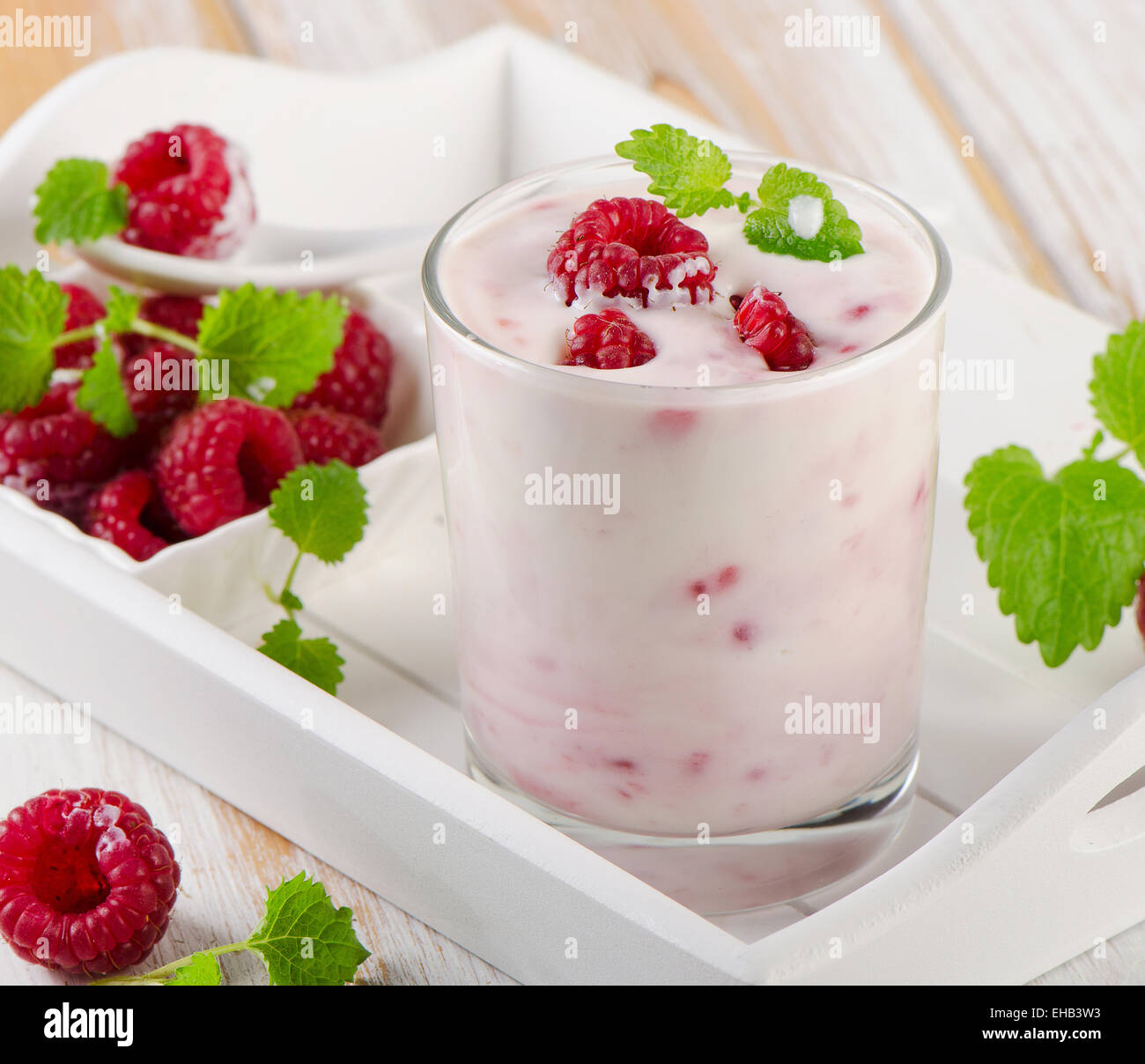 Raspberry yogurt with mint . Selective focus Stock Photo - Alamy