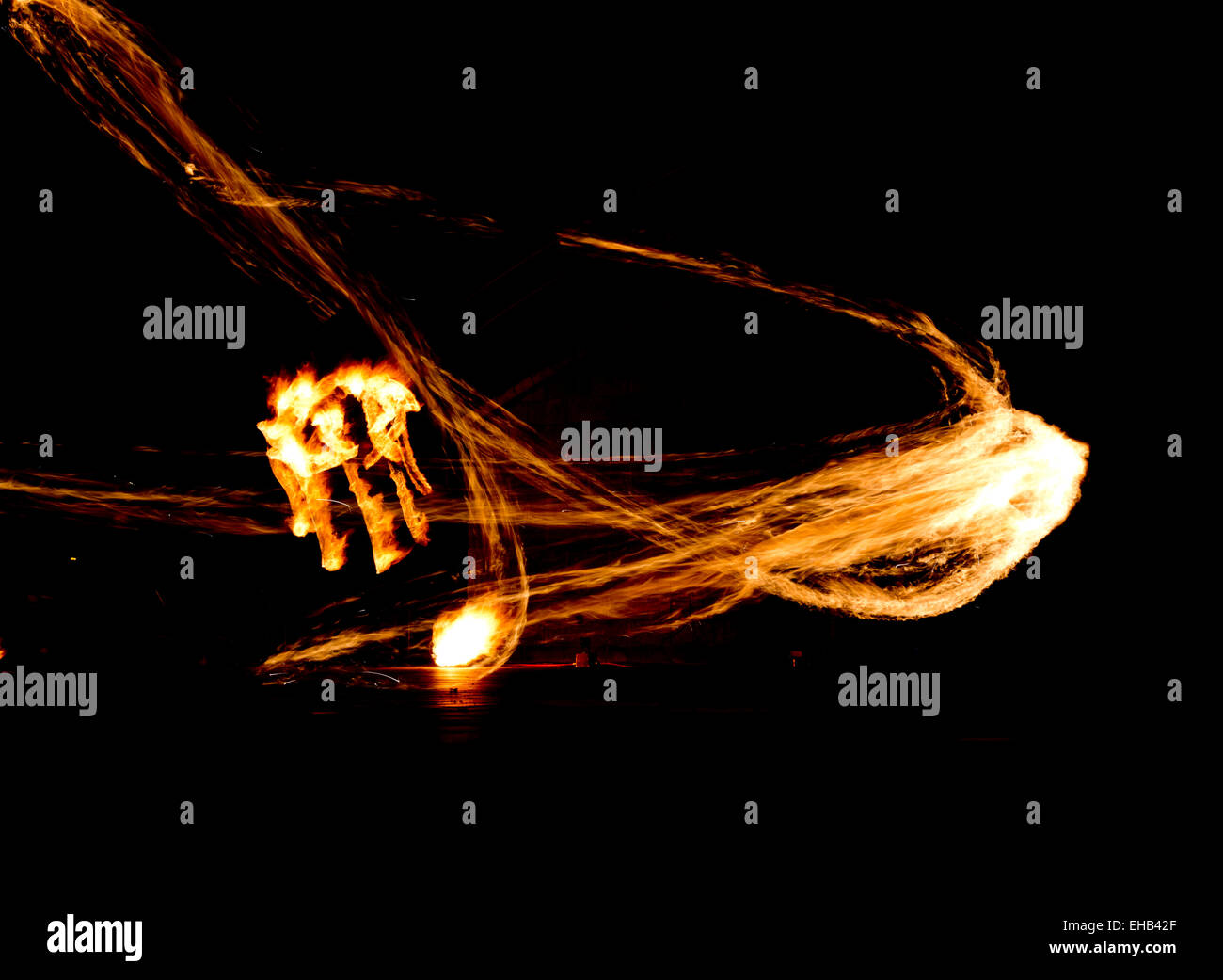 Fire Show Flaming Trails Stock Photo - Alamy