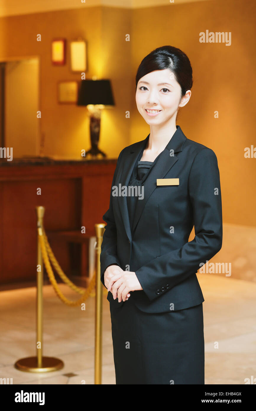 Japanese female hotel concierge Stock Photo - Alamy