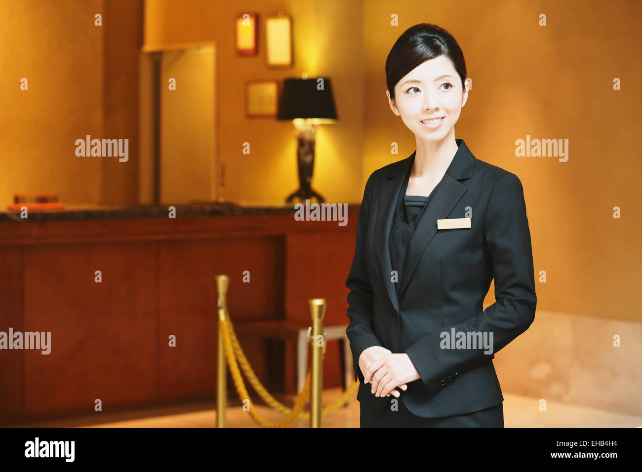 Japanese female hotel concierge Stock Photo - Alamy