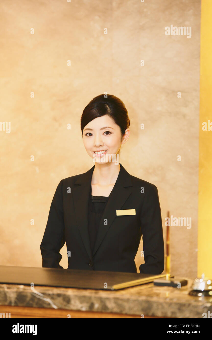 Japanese female hotel concierge Stock Photo - Alamy