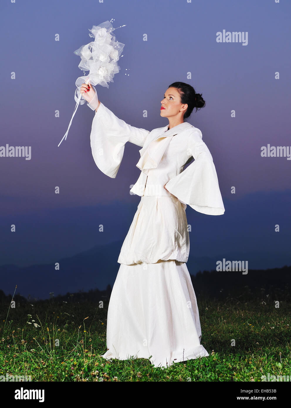 beautiful bride outdoor after wedding ceremny Stock Photo - Alamy