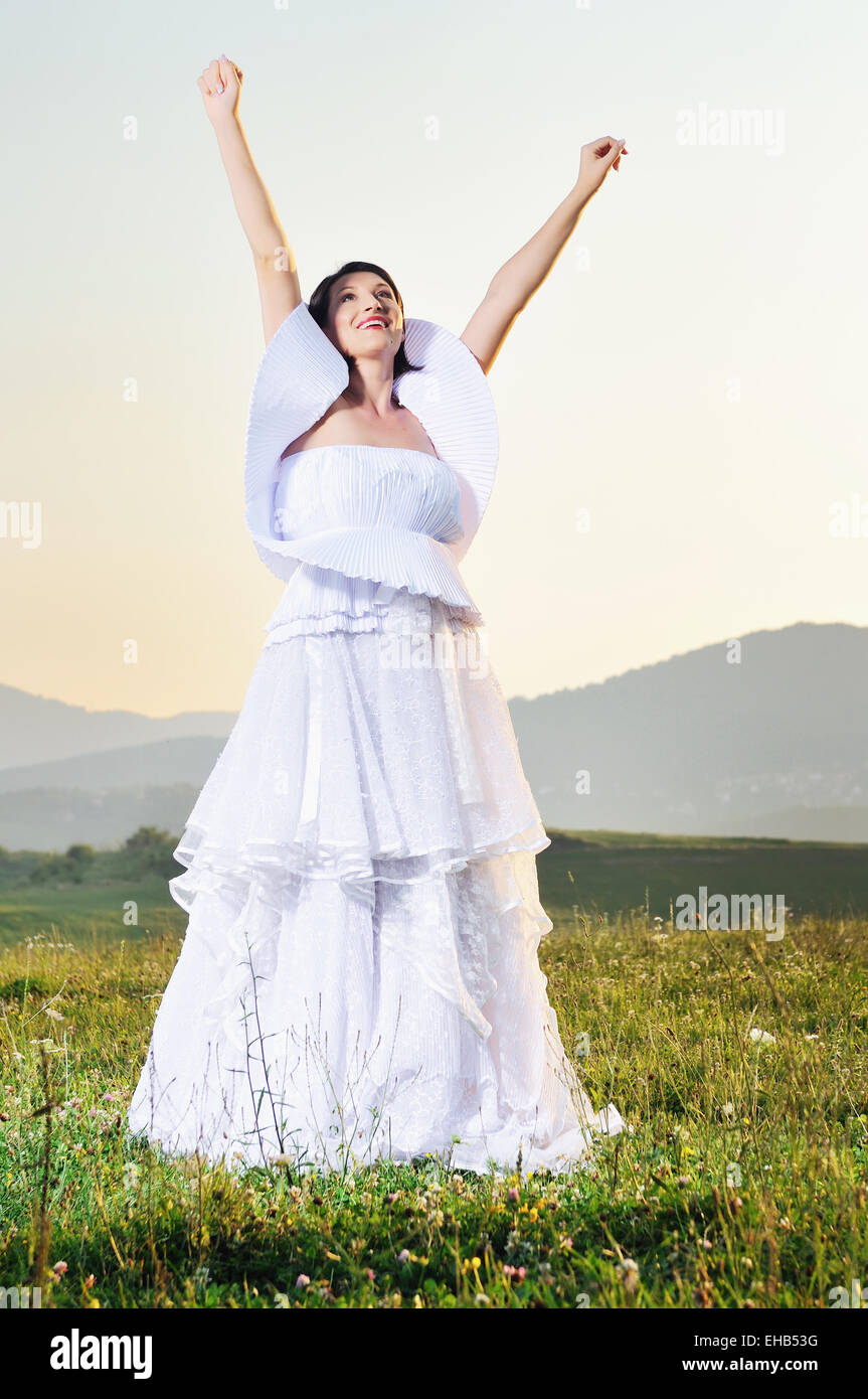 beautiful bride outdoor after wedding ceremny Stock Photo - Alamy