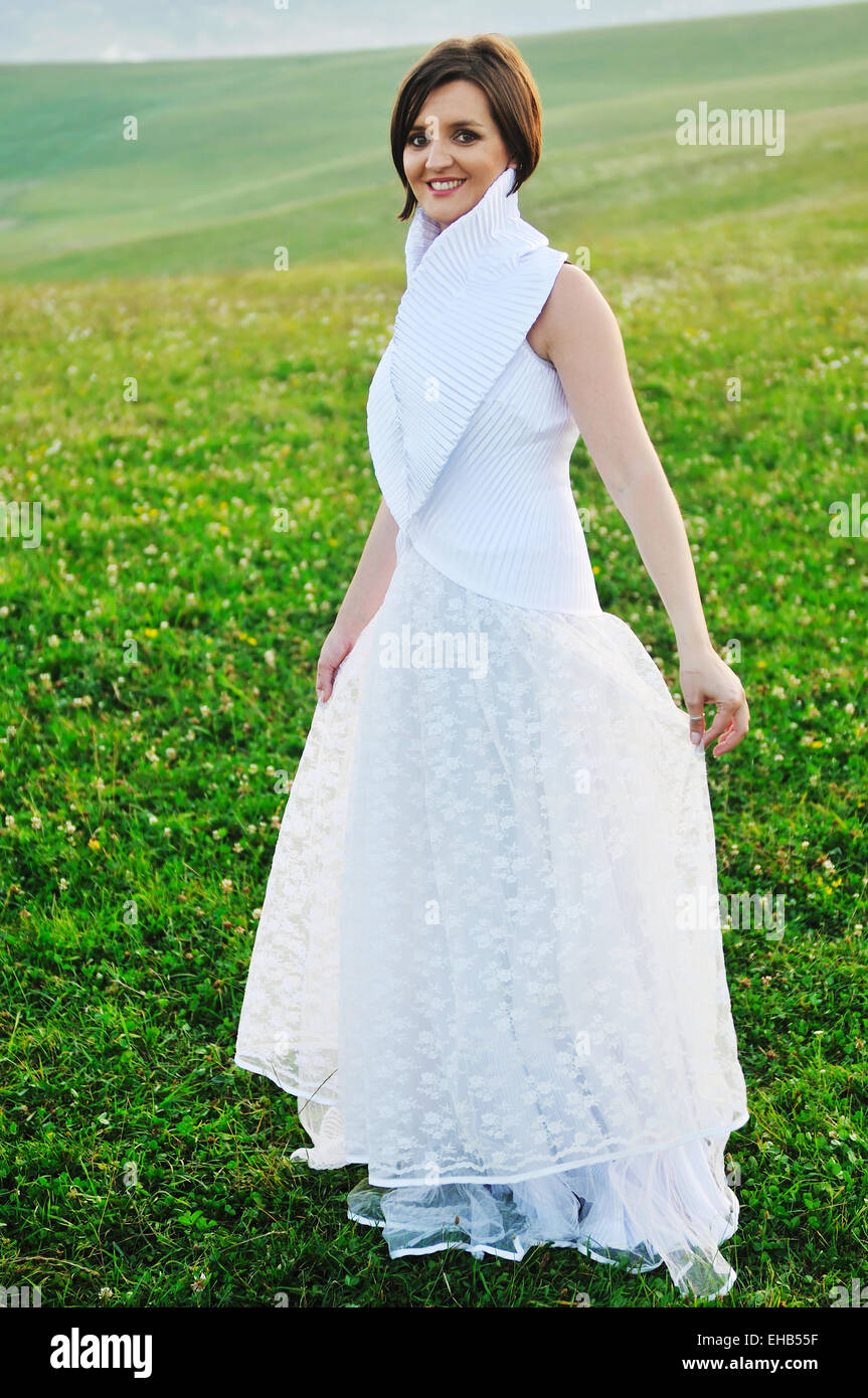 beautiful bride outdoor after wedding ceremny Stock Photo - Alamy