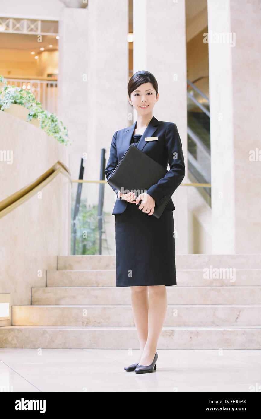 Japanese female hotel concierge Stock Photo - Alamy