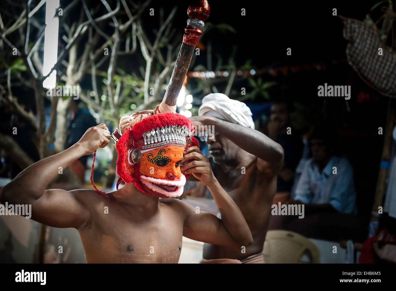 Theyyam Dancer, is getting ready with makeup for performance Stock ...