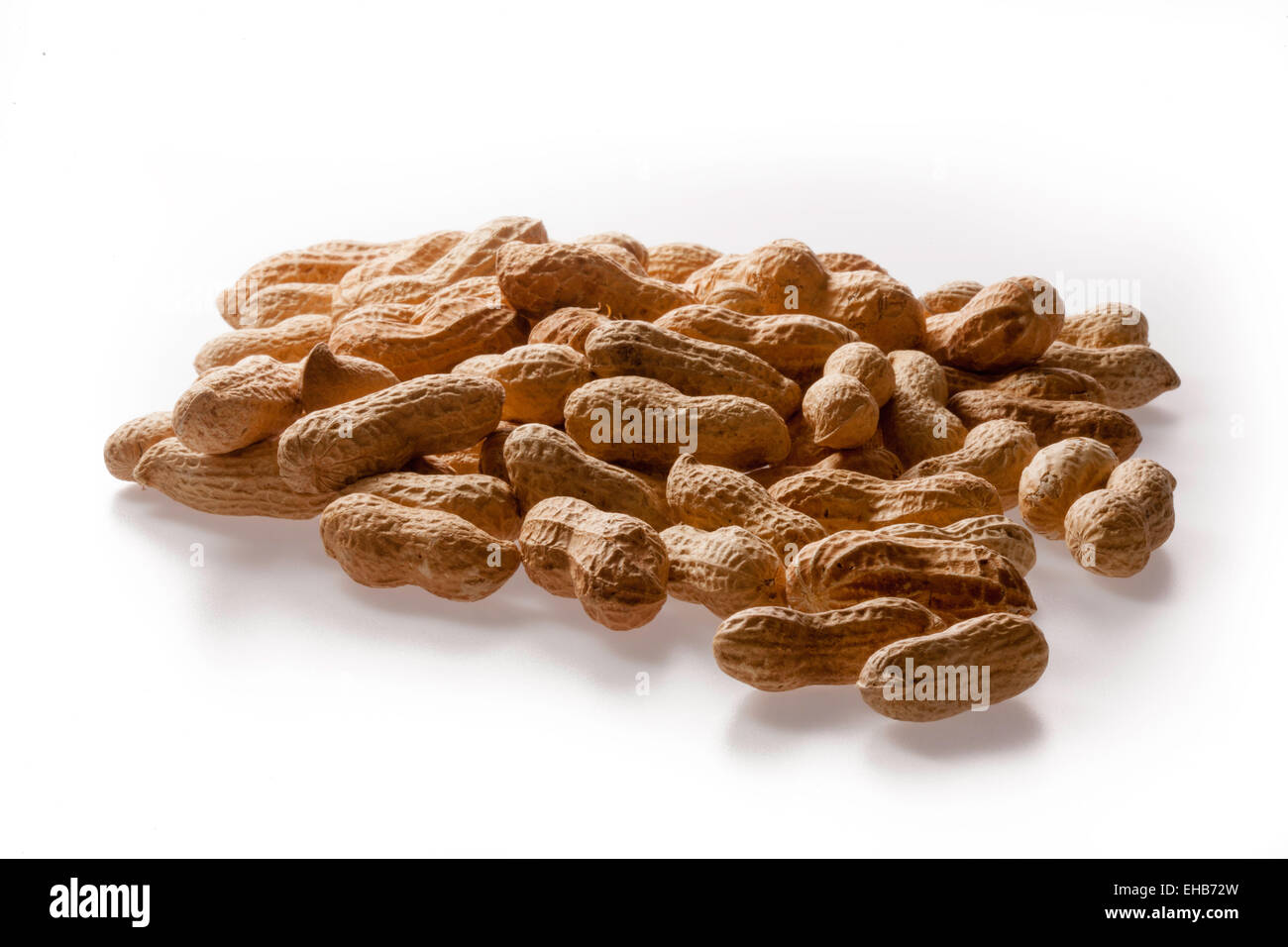 Whole peanuts in their shells with clipping path Stock Photo - Alamy