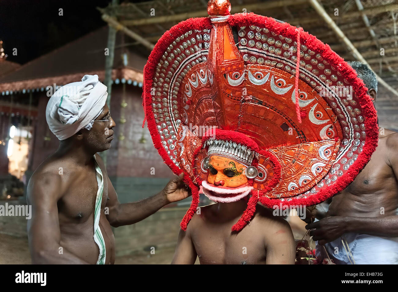Theyyam Dancer, is getting ready with makeup for performance Stock ...