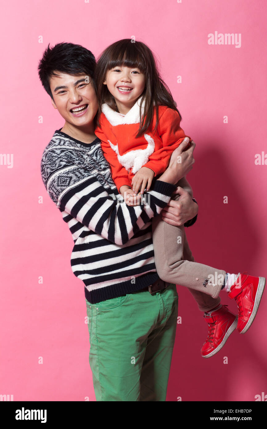 Father holding his daughter Stock Photo - Alamy Father holding his daughter Stock Photo - Alamy
