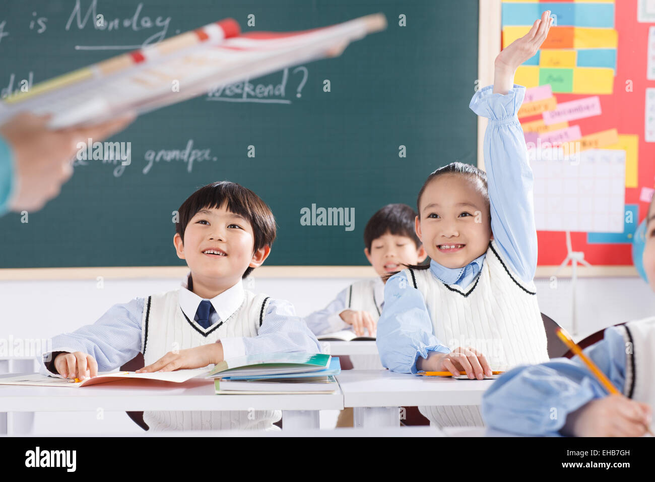 Elementary school students in class Stock Photo - Alamy