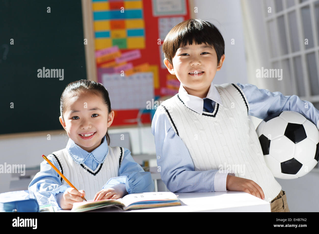 Elementary school students in class Stock Photo - Alamy