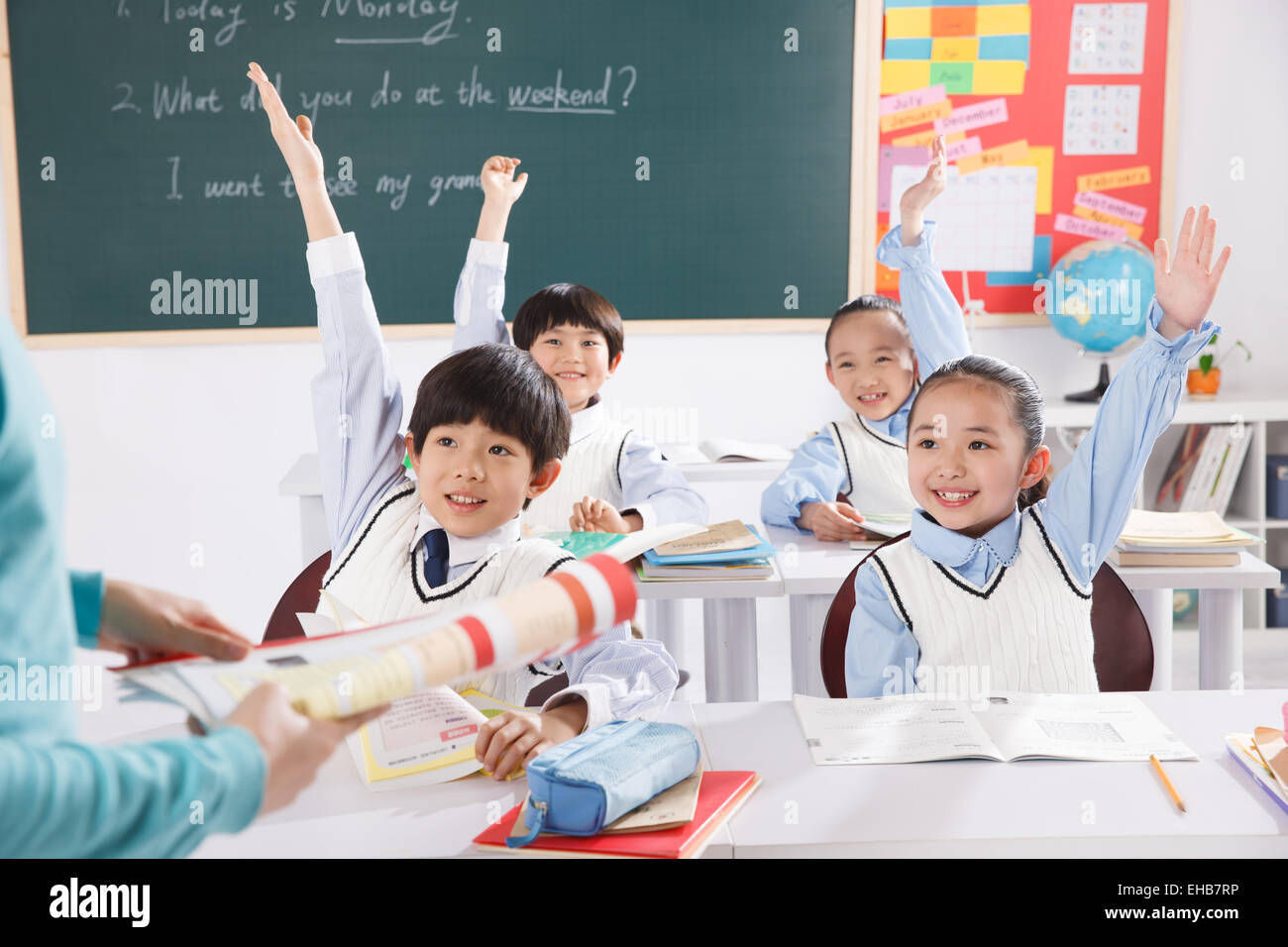 Elementary school students in class Stock Photo - Alamy