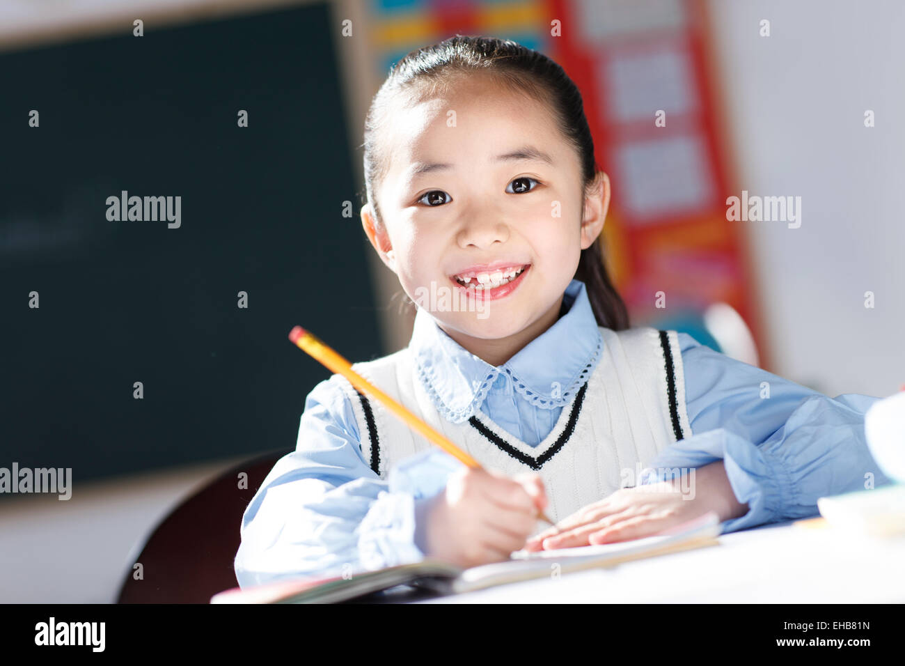 Elementary school students in class Stock Photo - Alamy