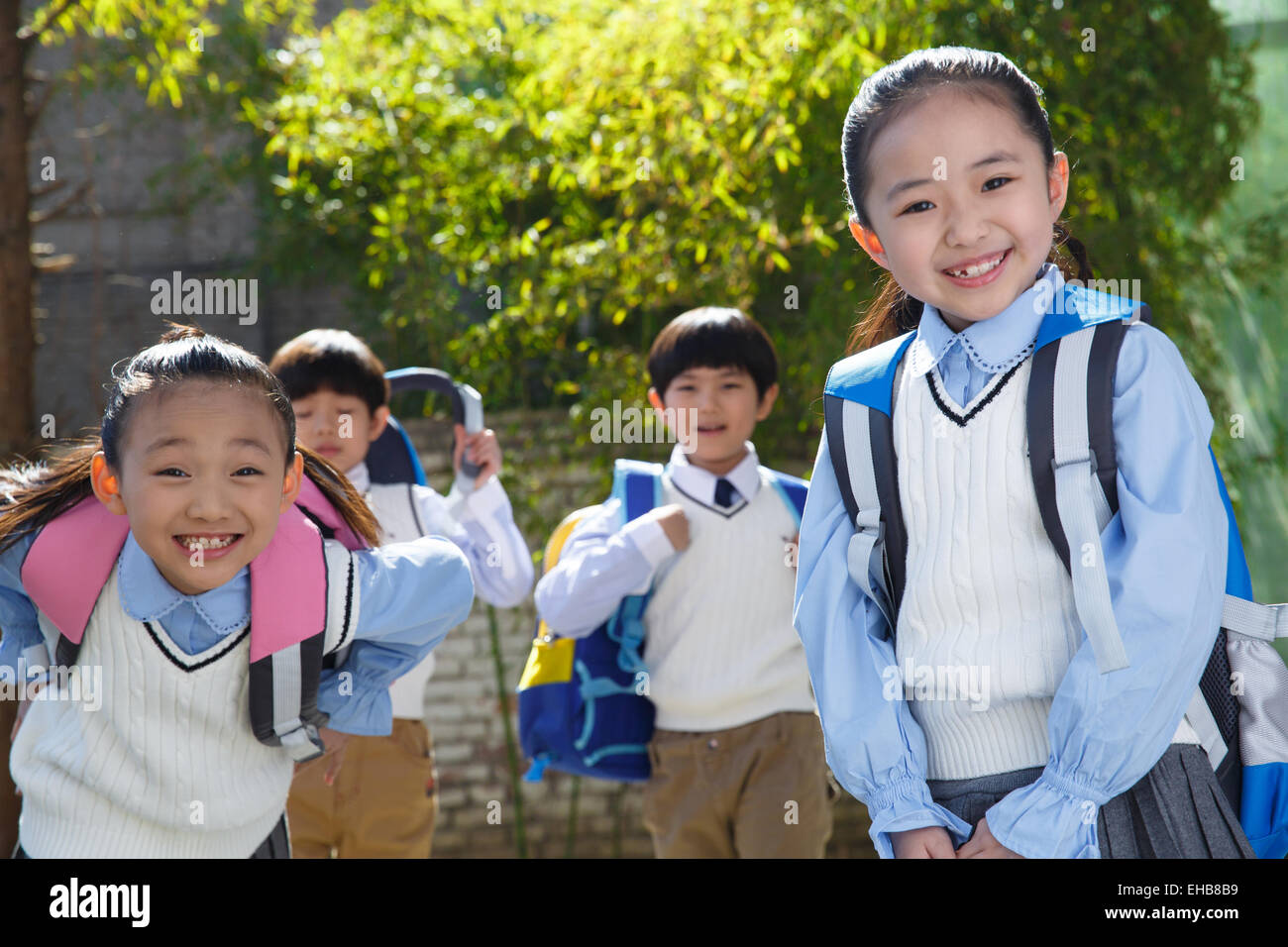 School children running in uniform hi-res stock photography and images ...