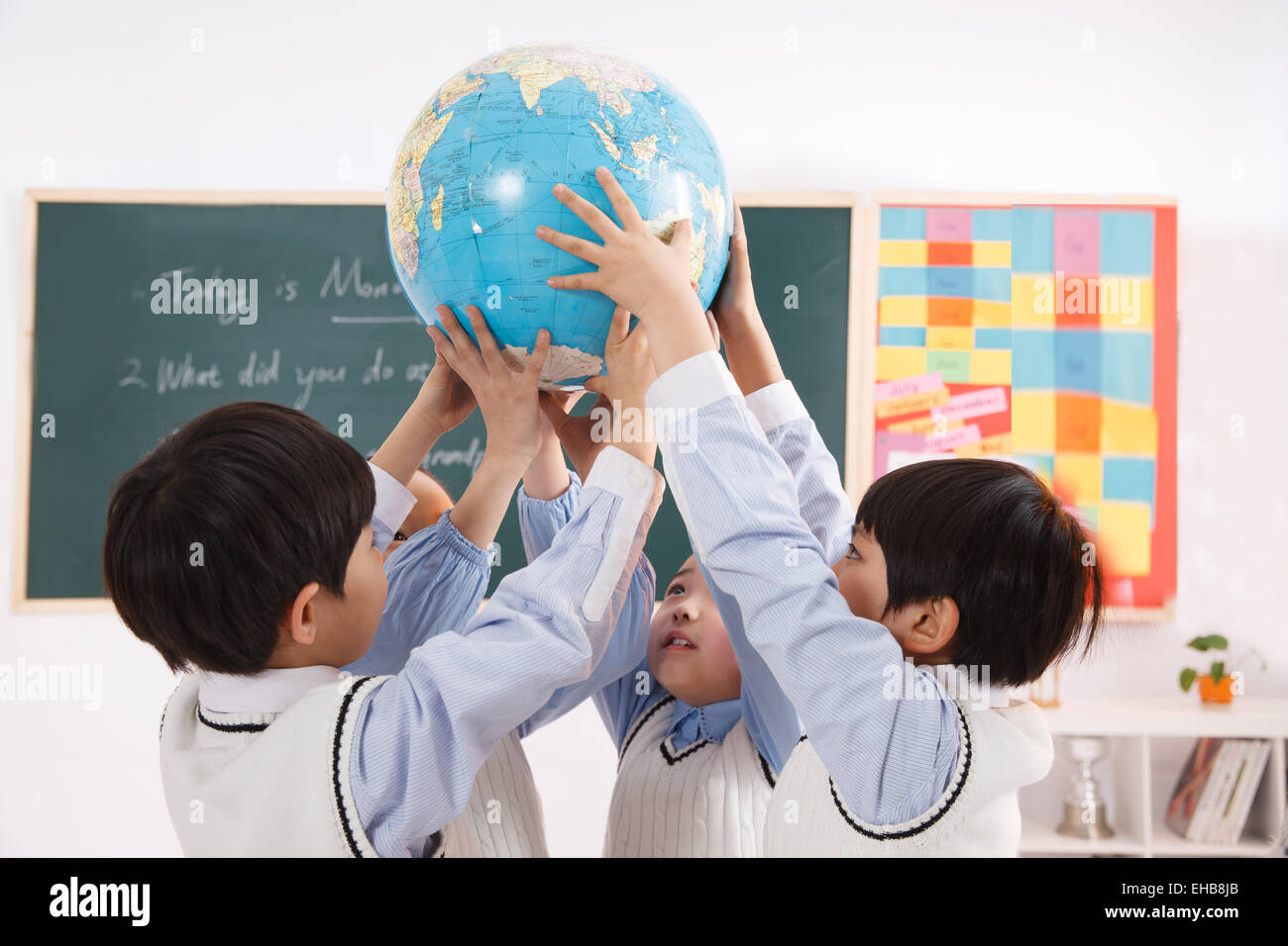 Elementary school students in class Stock Photo - Alamy