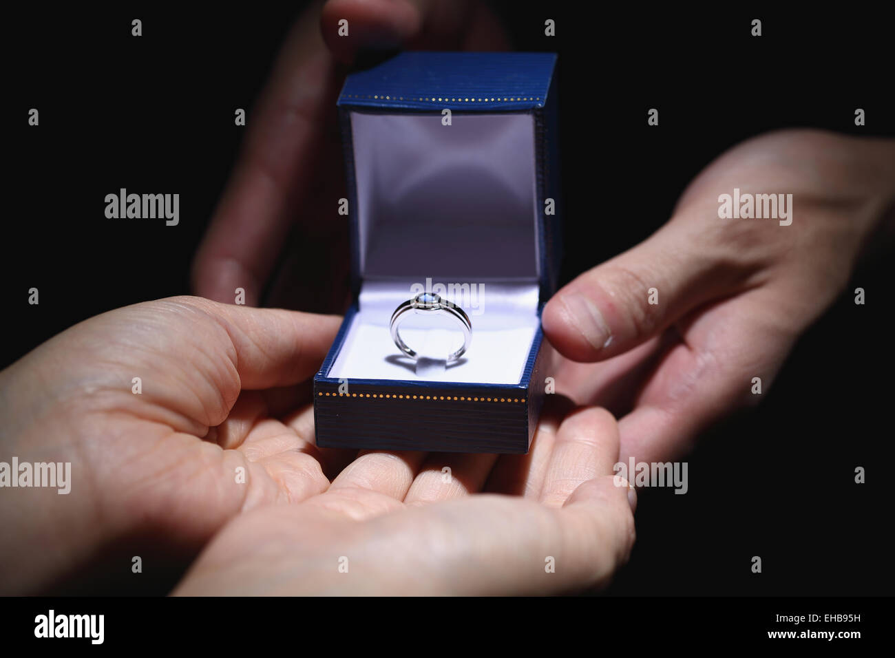 Man giving engagement ring Stock Photo - Alamy