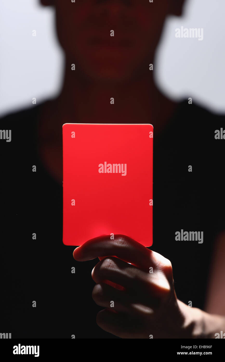 Man holding red card Stock Photo - Alamy