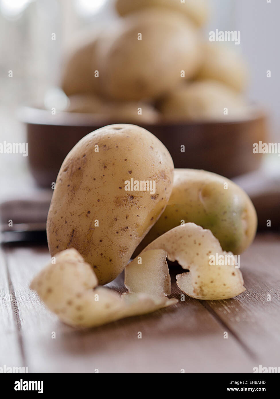 Raw potatoes on a tray Stock Photo - Alamy