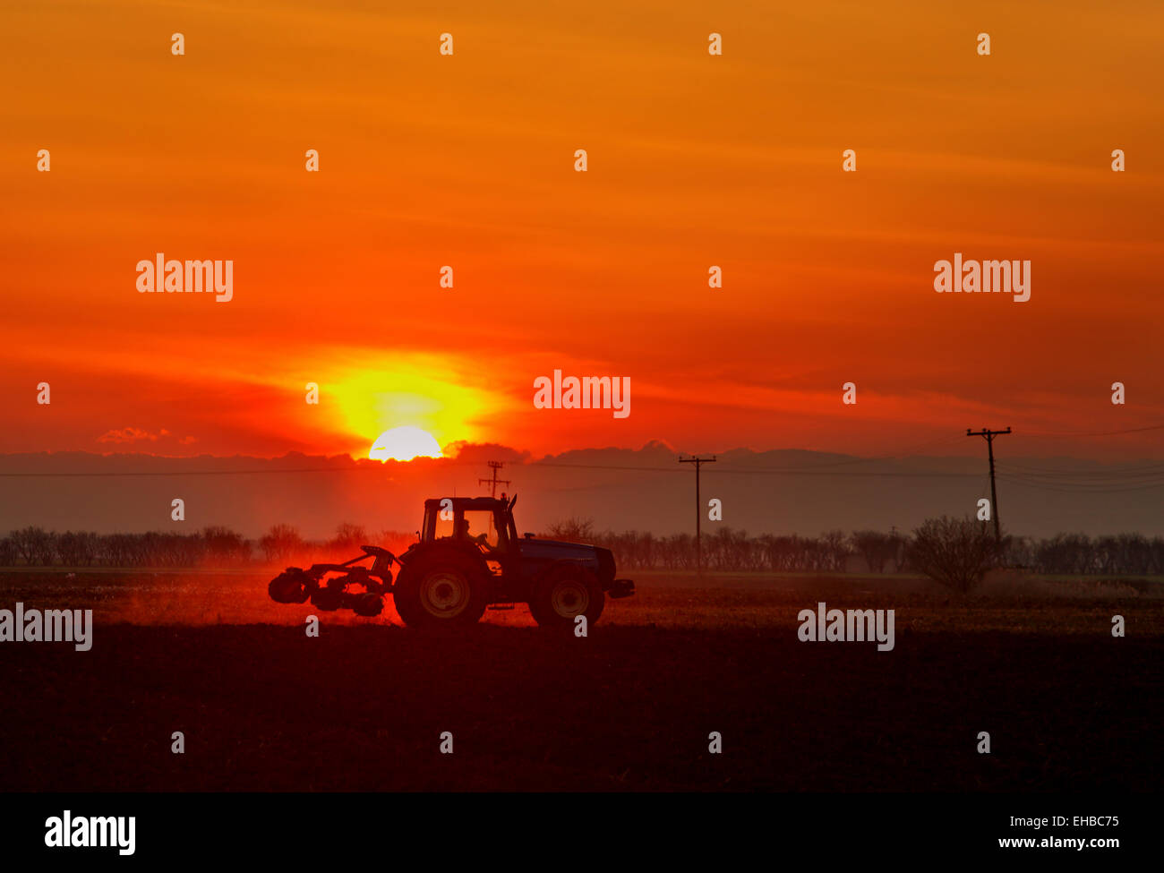Tractor in the plains of Larissa, Thessaly, Greece Stock Photo - Alamy
