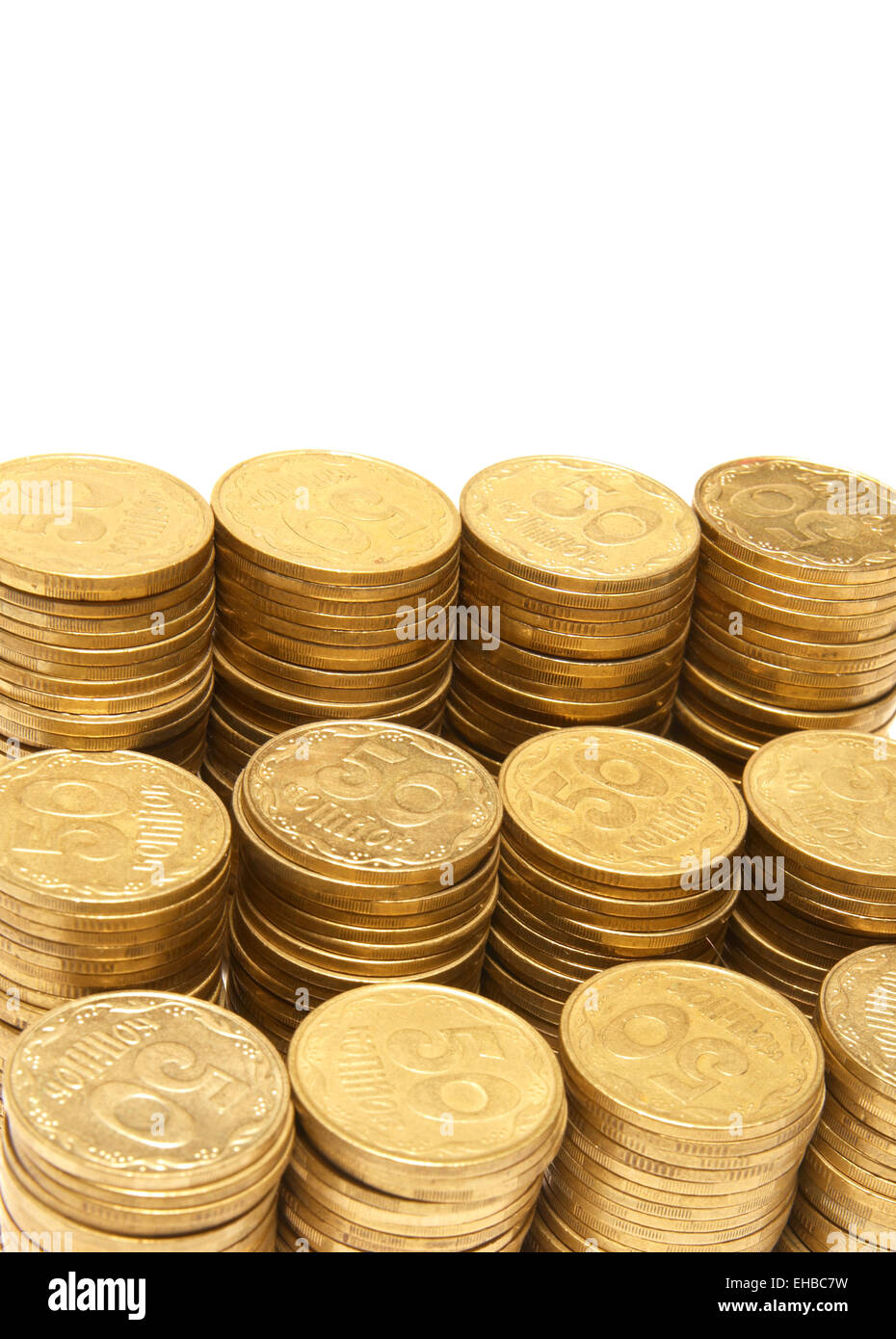 Stack of golden coins isolated on white Stock Photo - Alamy