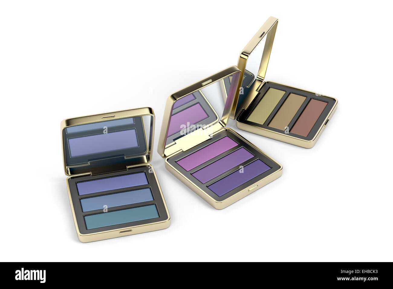 Different eye shadows in gold boxes on white background Stock Photo - Alamy