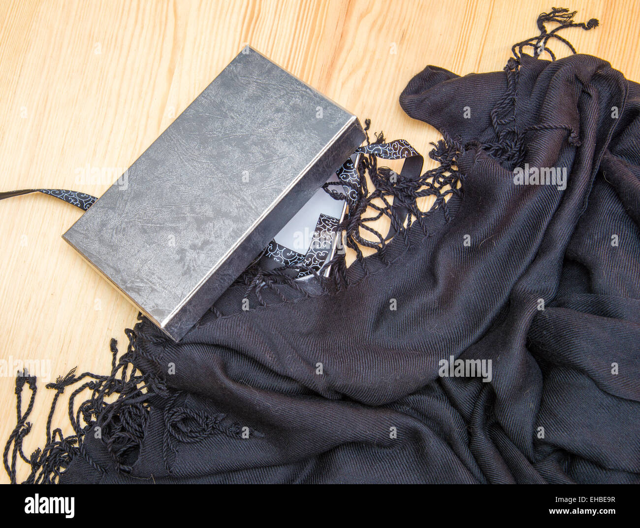 a surprise gift box on the fabric Stock Photo - Alamy